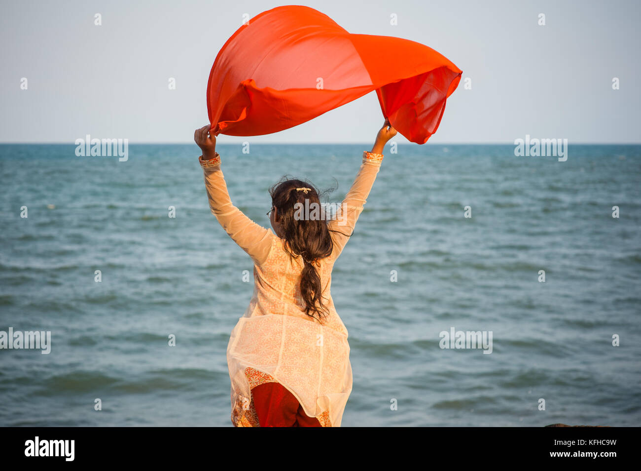 Red scarf wind hi-res stock photography and images - Alamy