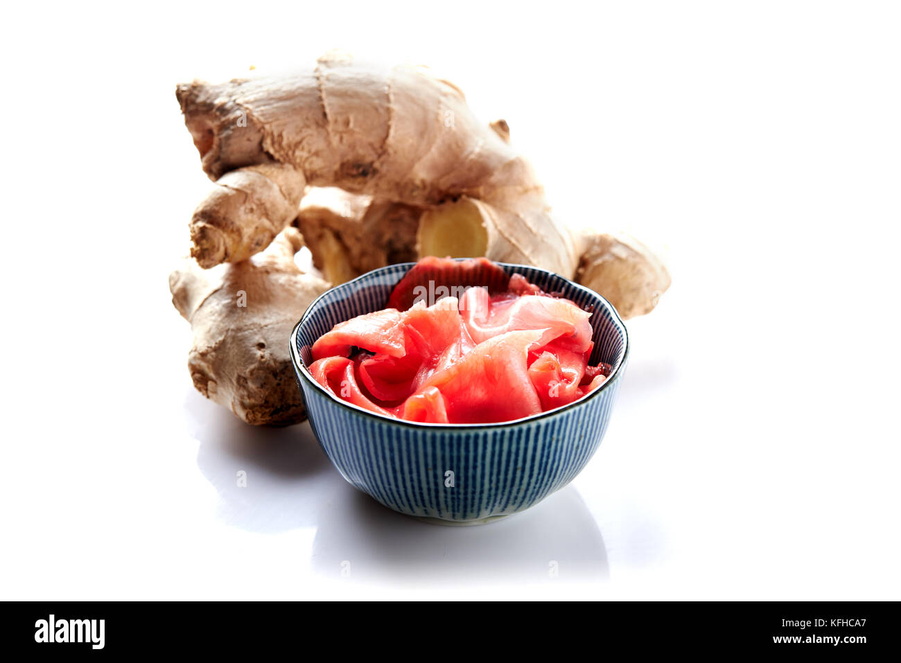 pickled ginger and fresh root ginger isolated on white background Stock ...