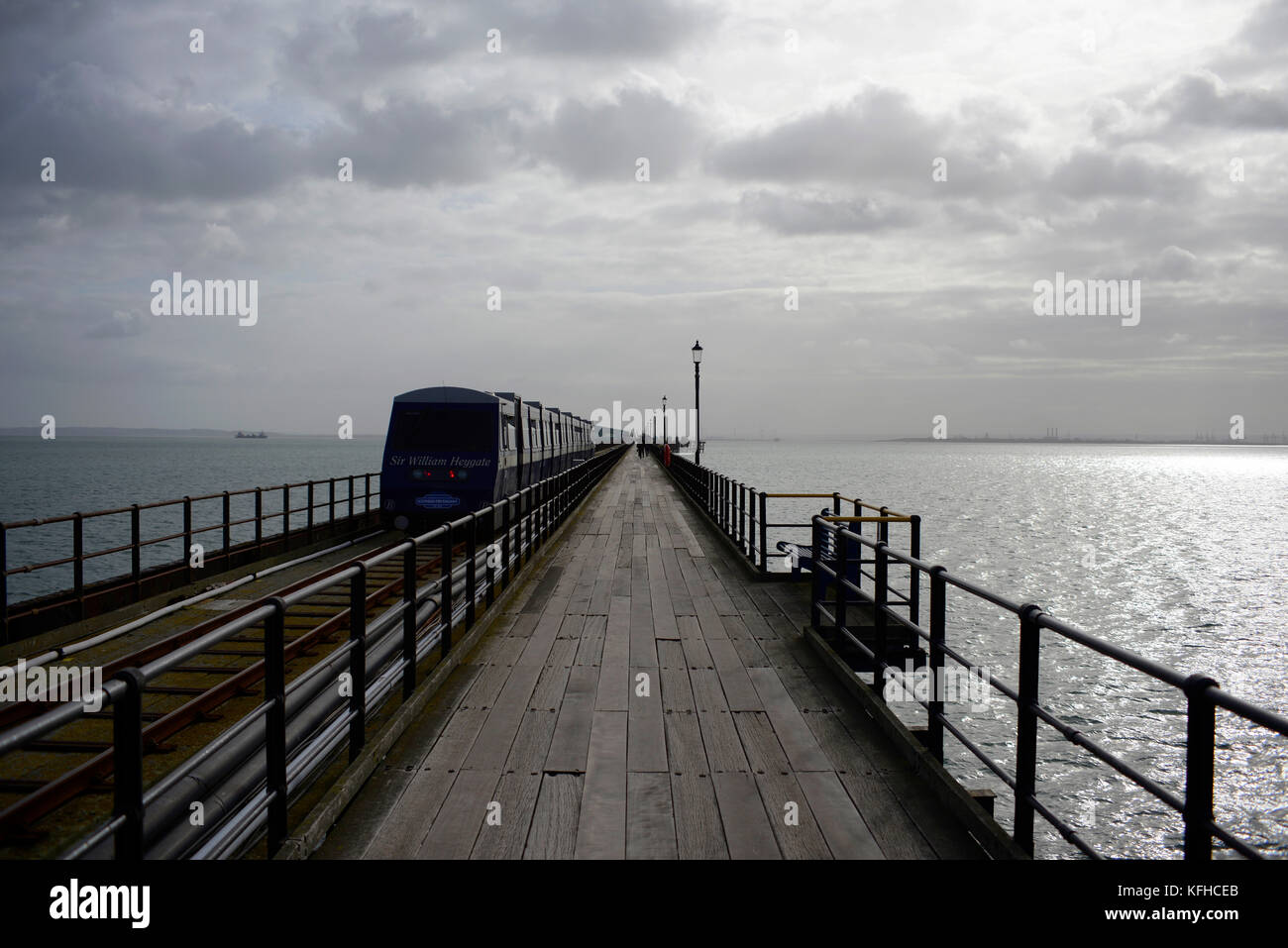 Southend Pier railway heading towards the Thames Estuary. Wide view ...