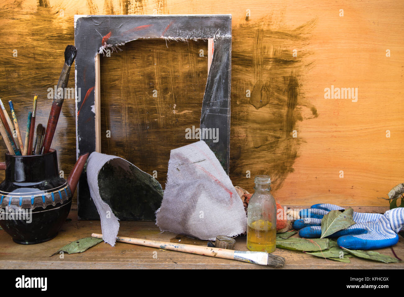 Destroyed artist canvas in artist studio Stock Photo - Alamy