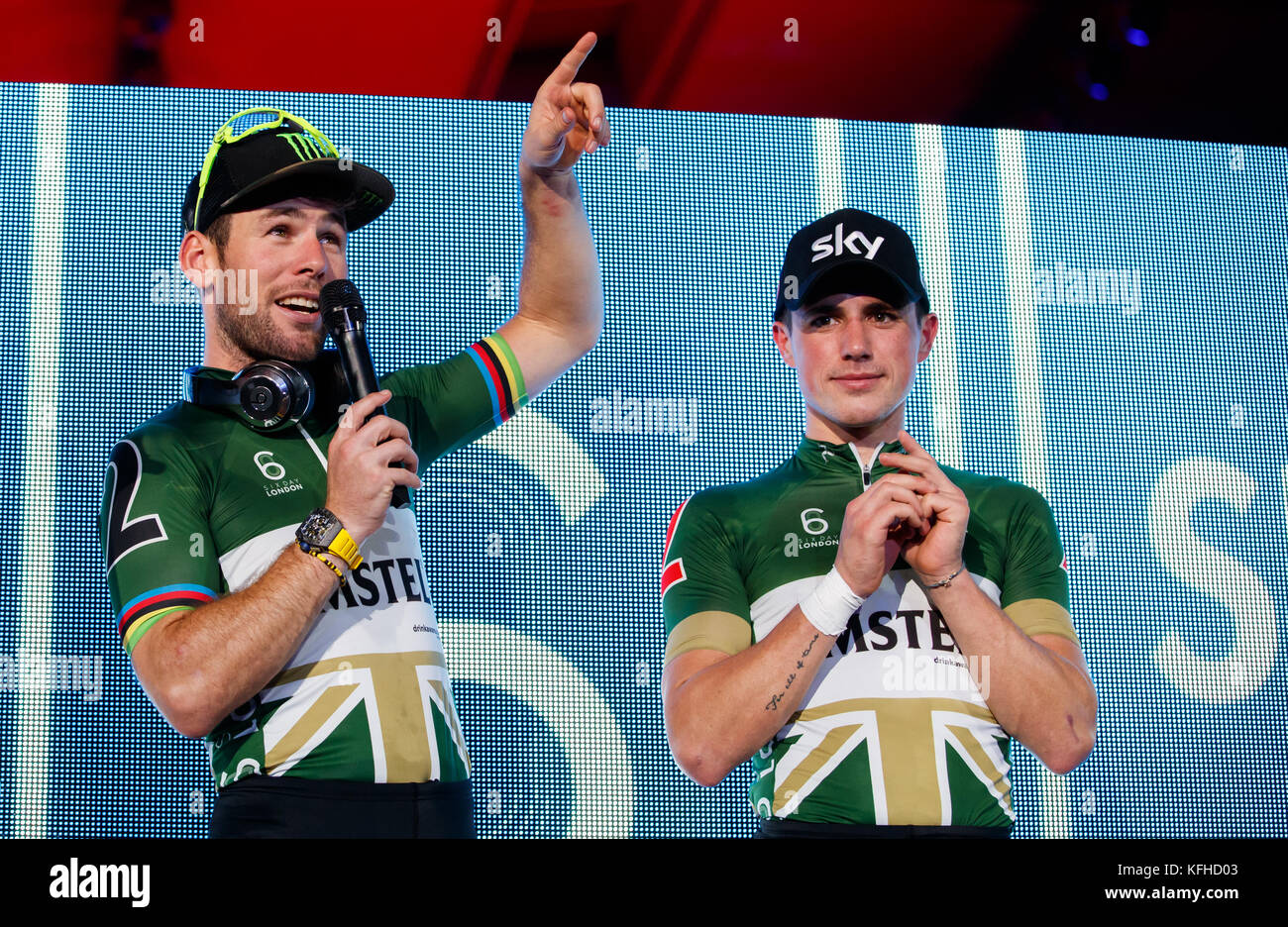 Great Britain's Mark Cavendish (left) addresses the crowd alongside ...