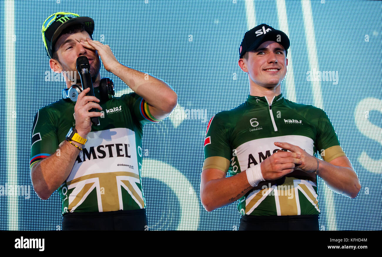Great Britain's Mark Cavendish (left) addresses the crowd alongside ...