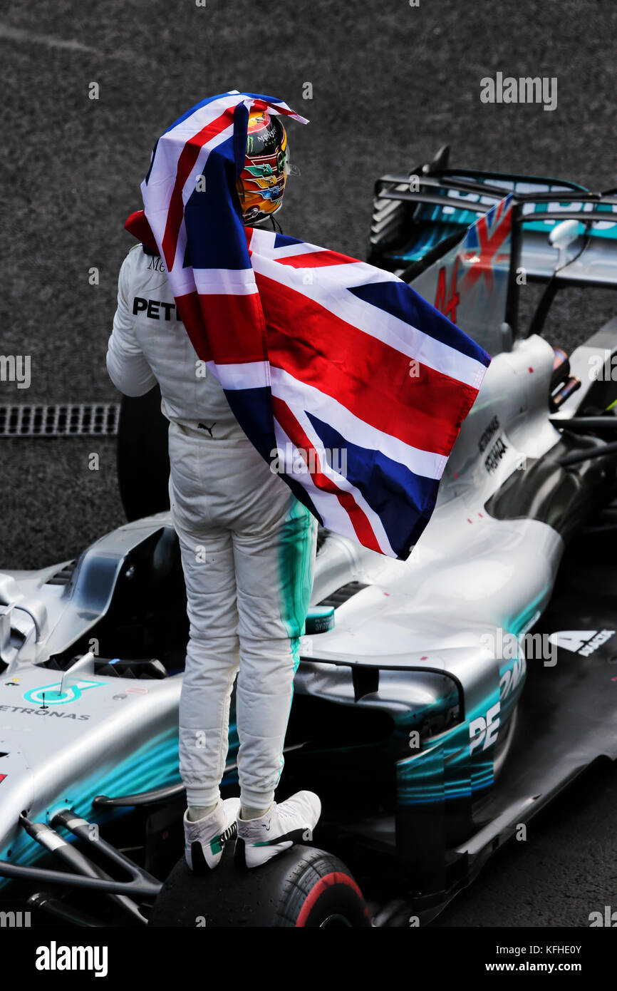 Mercedes' Lewis Hamilton celebrates winning the Formula One drivers ...