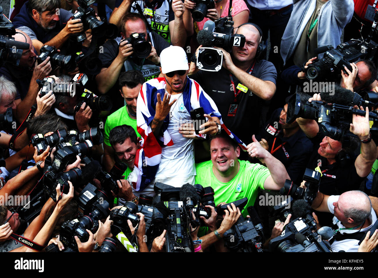 Mercedes' Lewis Hamilton celebrates winning the Formula One drivers ...