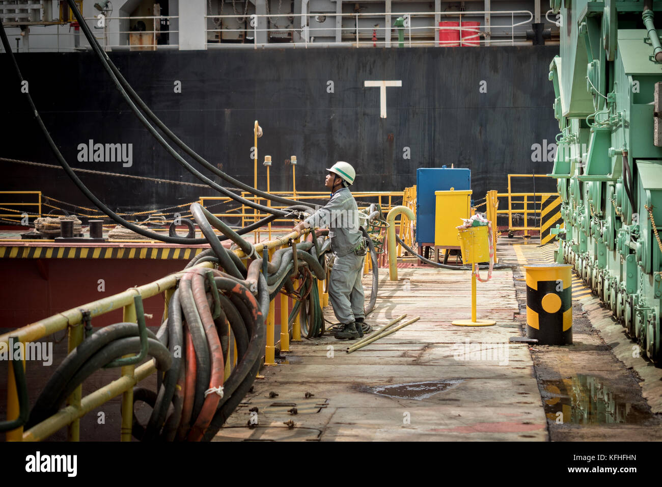 Two foreman supervise welding works. Cam Rahn shipyard, Vietnam Stock ...