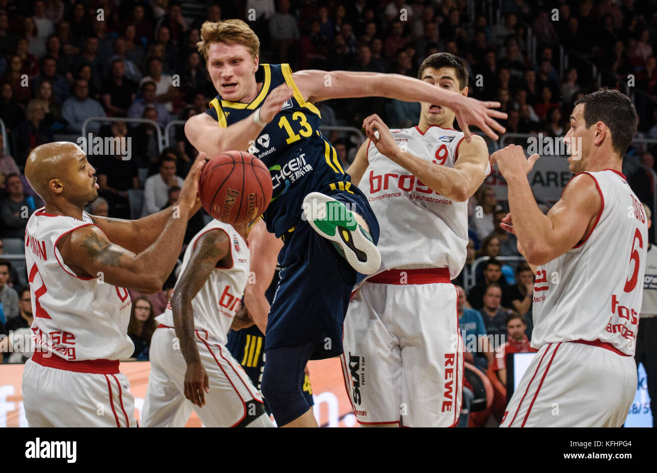 Bamberg's Ricky Hickman (L), Luka Mitrovic (2-R), Nikolaos Zisis (R ...