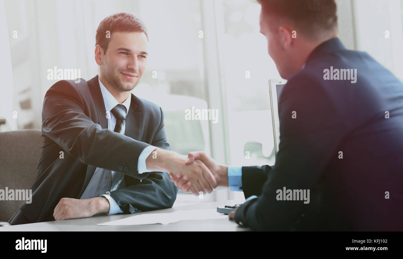 businessman shaking hands in office Stock Photo - Alamy