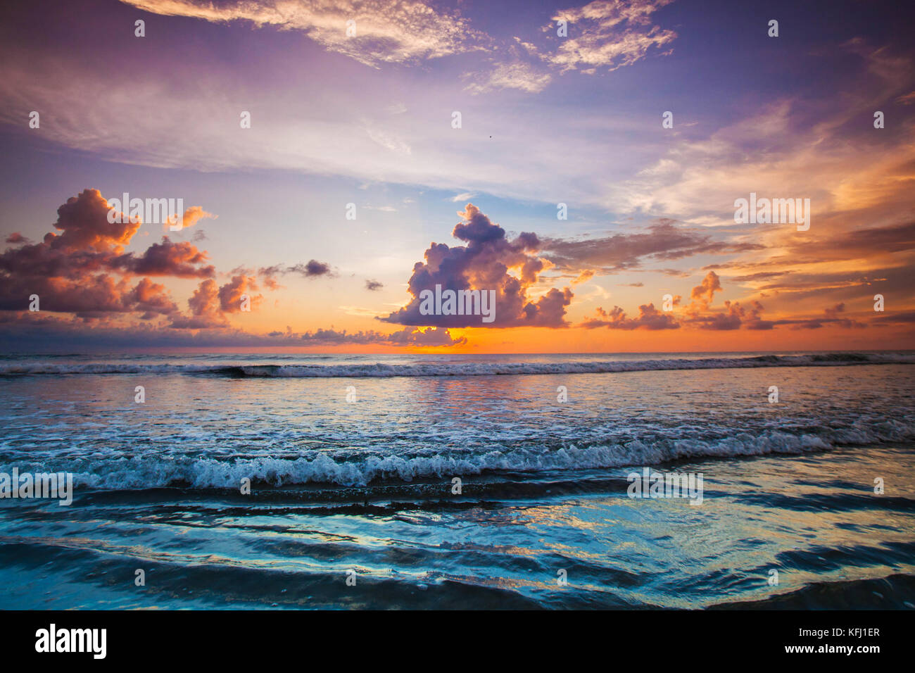 Multi colored sunset in Bali, Indonesia Stock Photo - Alamy