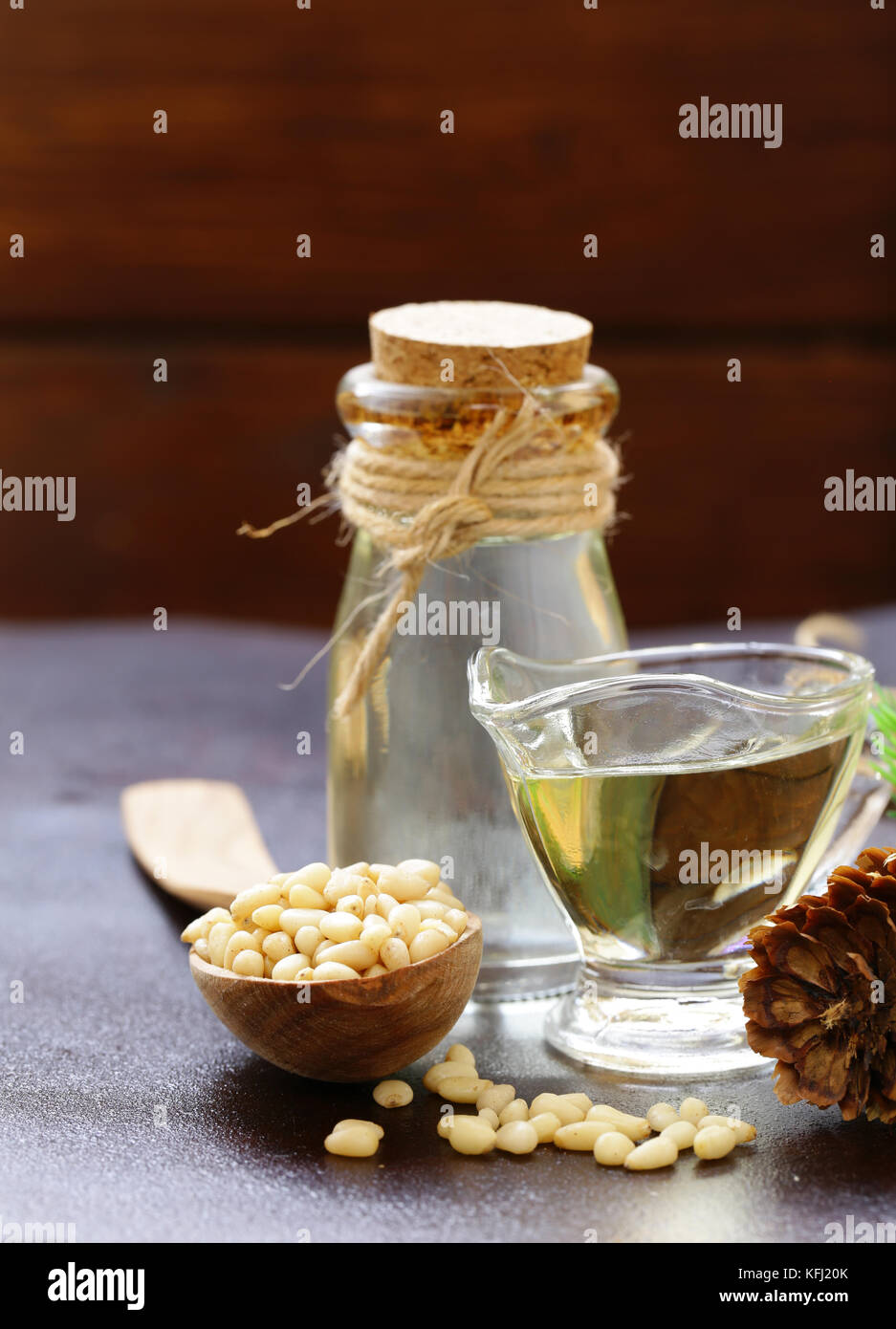 Organic vegetable oil from pine nuts on a table Stock Photo - Alamy
