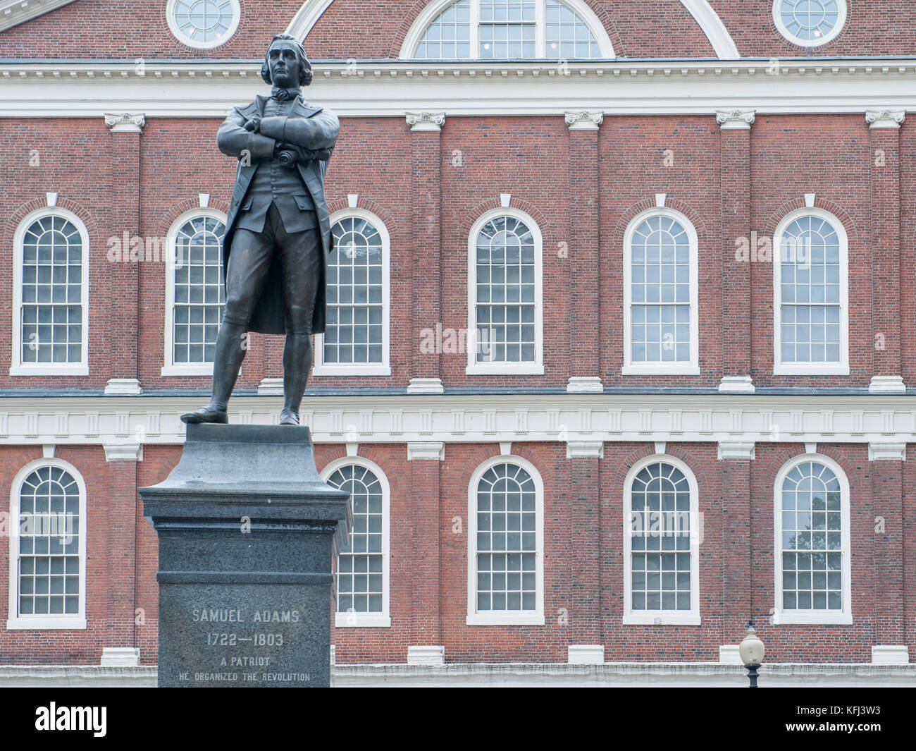 Samuel Adams statue in front of Faneuil Hall in Boston. Faneuil Hall ...