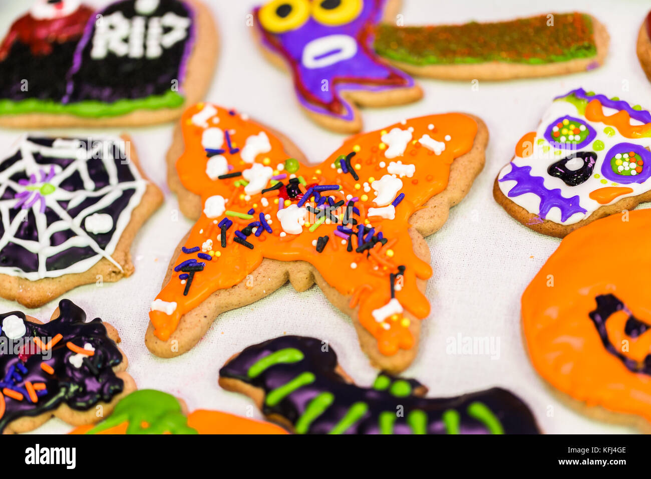 Step by step. Learning how to make and decorate Halloween cookie decorating class Stock Photo ...