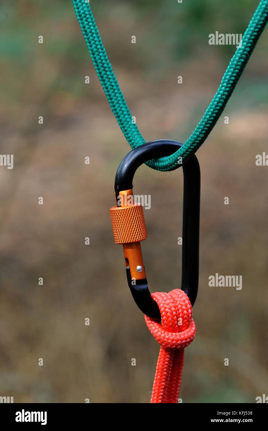 Carabiner with rope on nature background. Climbing uquipment.Climbing ...