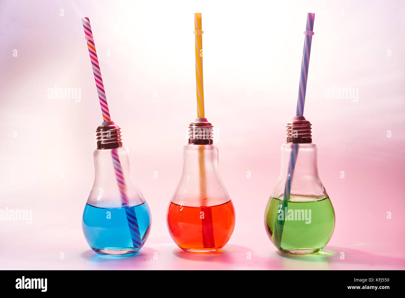 Cocktail drinks in light bulb shape glasses for party Stock Photo - Alamy