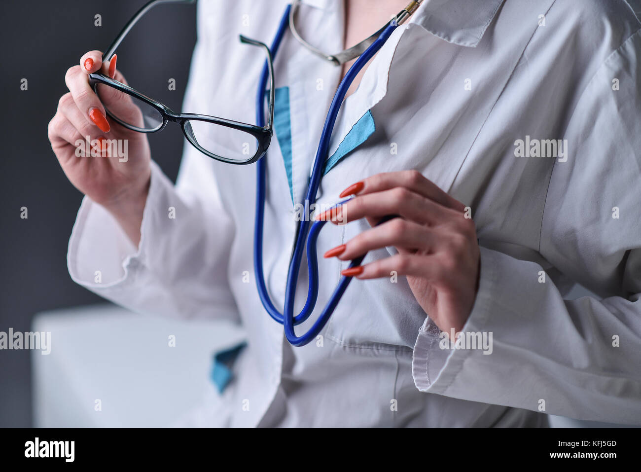 A stethoscope in the hands Stock Photo - Alamy