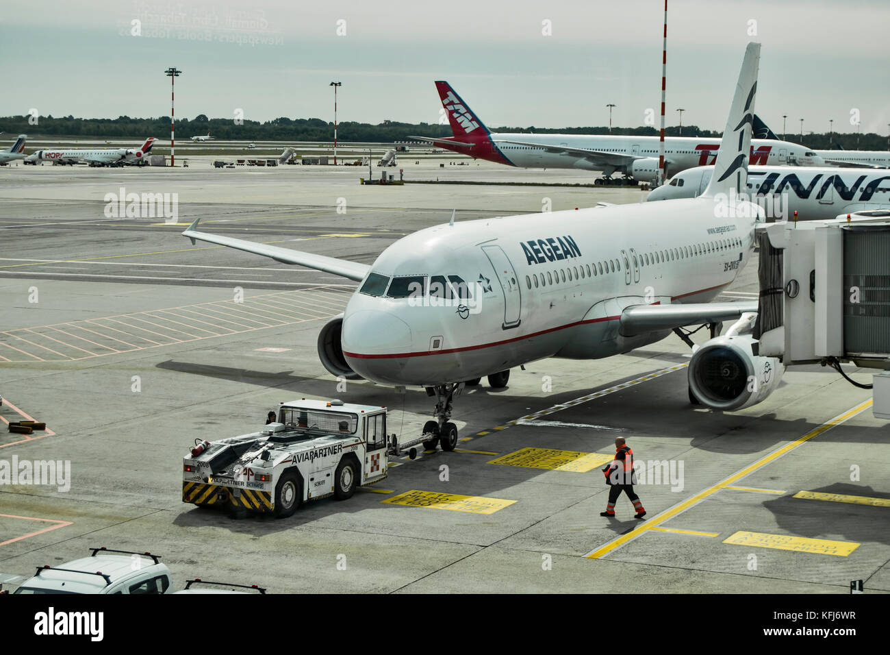 a view on Airbus A320 at gate in Milan Malpensa airport, ready for ...