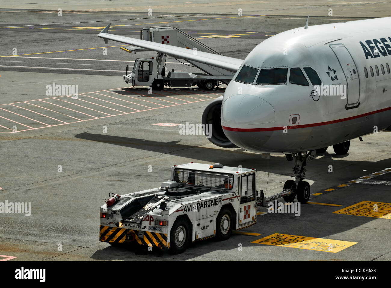 a view on Airbus A320 at gate in Milan Malpensa airport, ready for ...