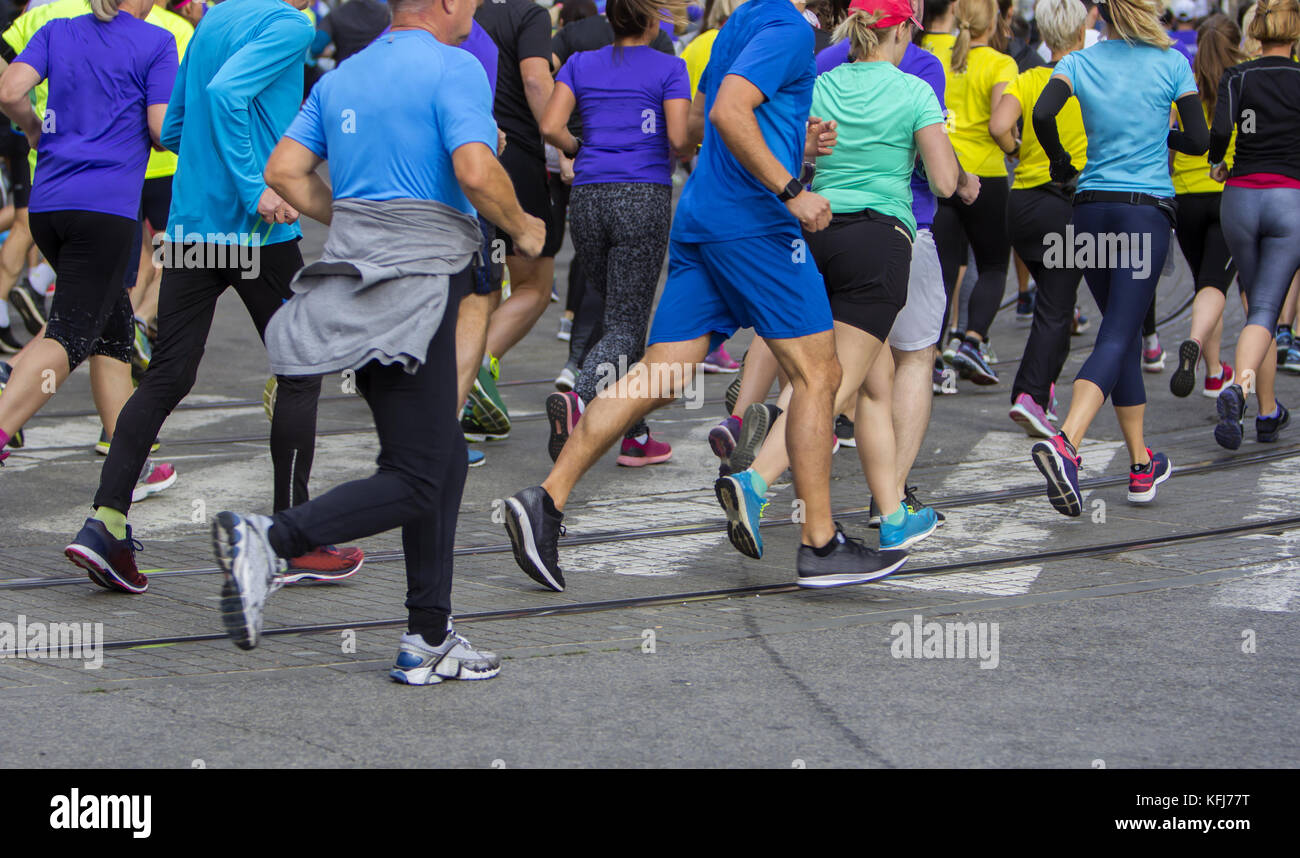 Marathon running race on the city road Stock Photo - Alamy