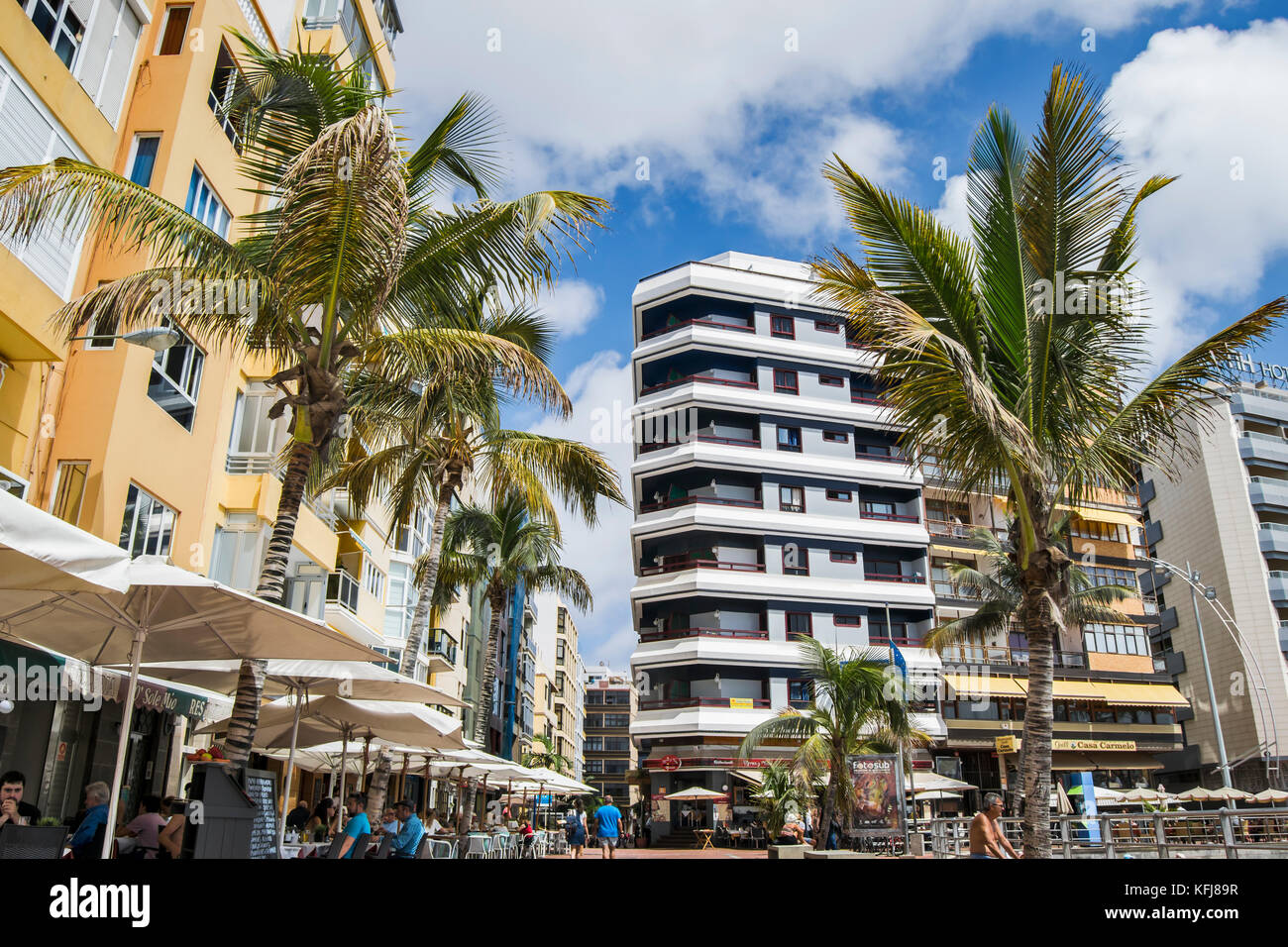 a view on colorful and modern buildings on Las Palmas seafront with a ...