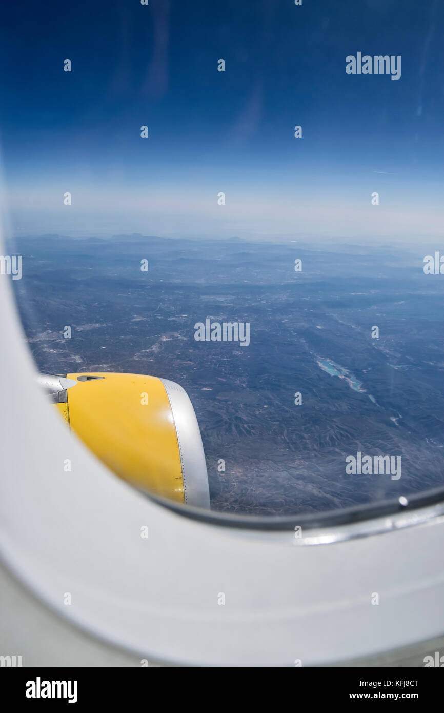an aerial view on panorama viewed trough a window of an airplane Stock ...
