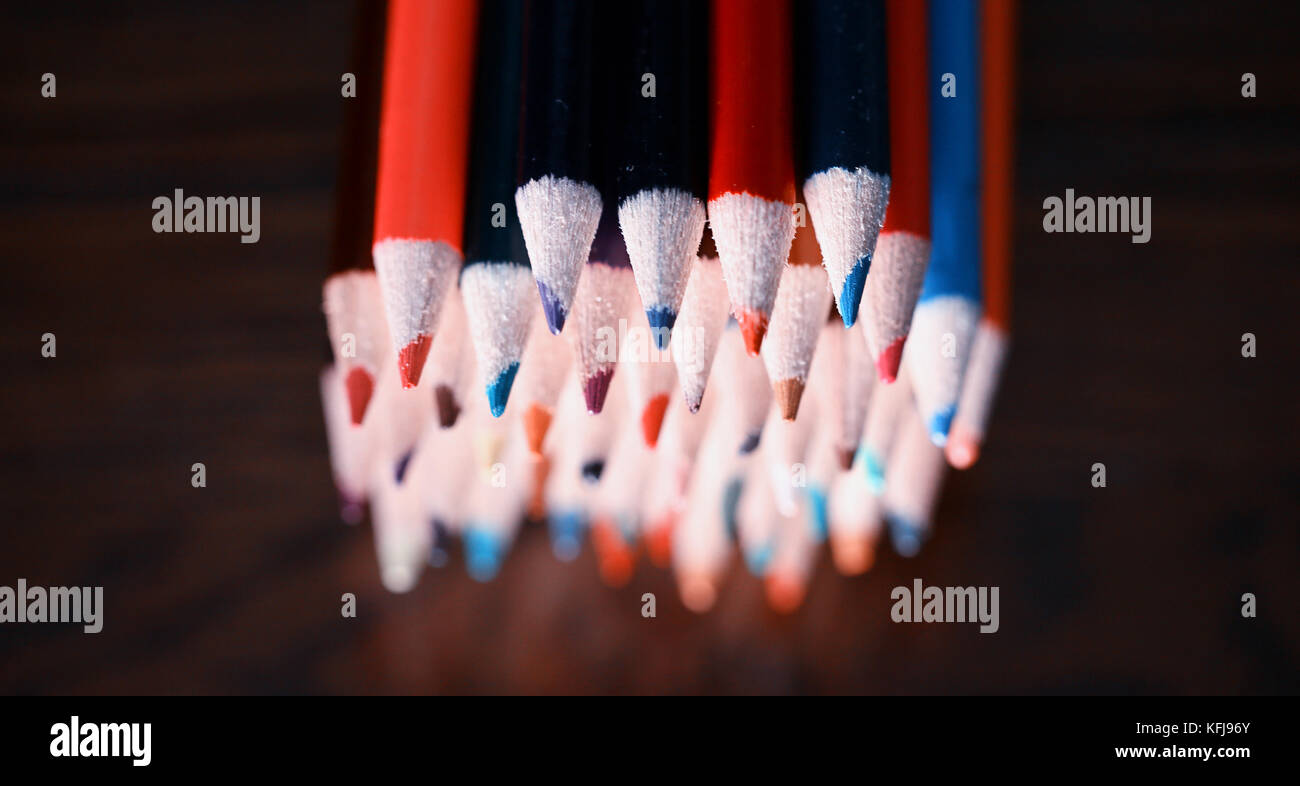 Multicolored pencils on the table. A stack of colored pencils ti Stock ...
