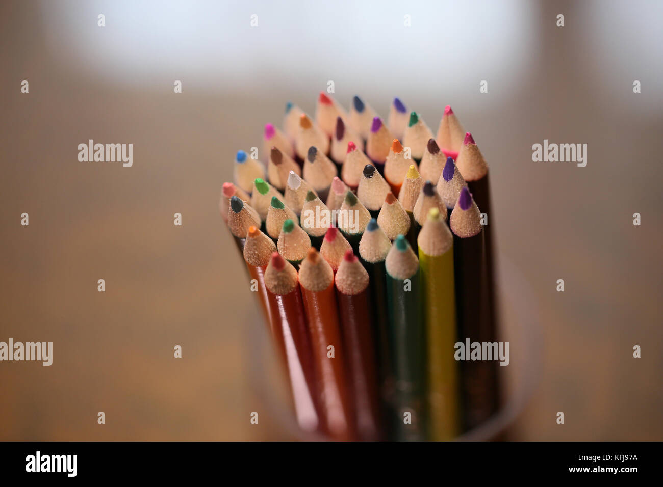 Multicolored pencils on the table. A stack of colored pencils ti Stock ...