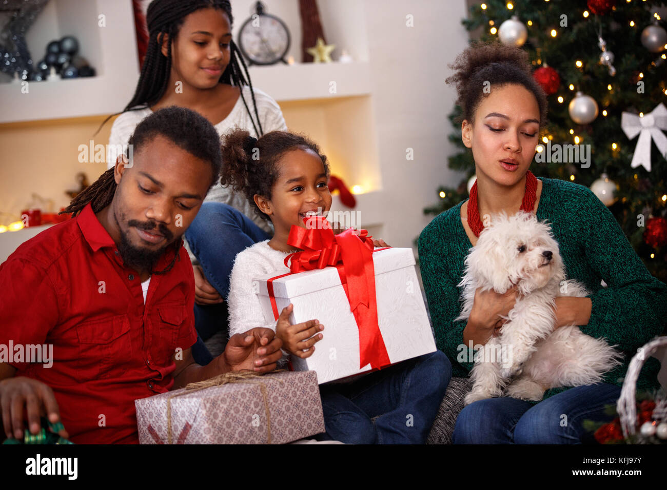 Family idyll for Christmas at home Stock Photo - Alamy