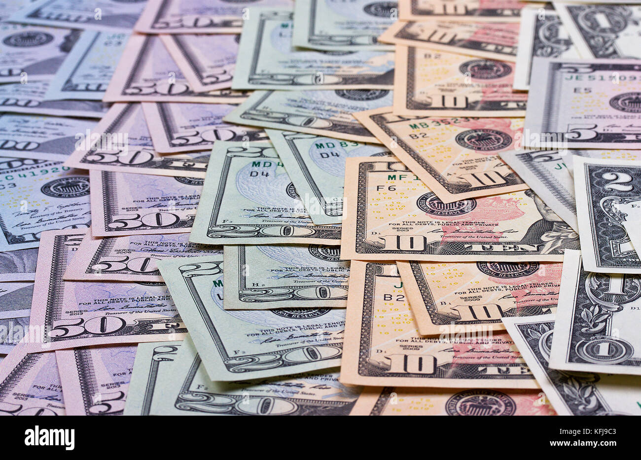 American dollar of different denominations blured background Stock ...