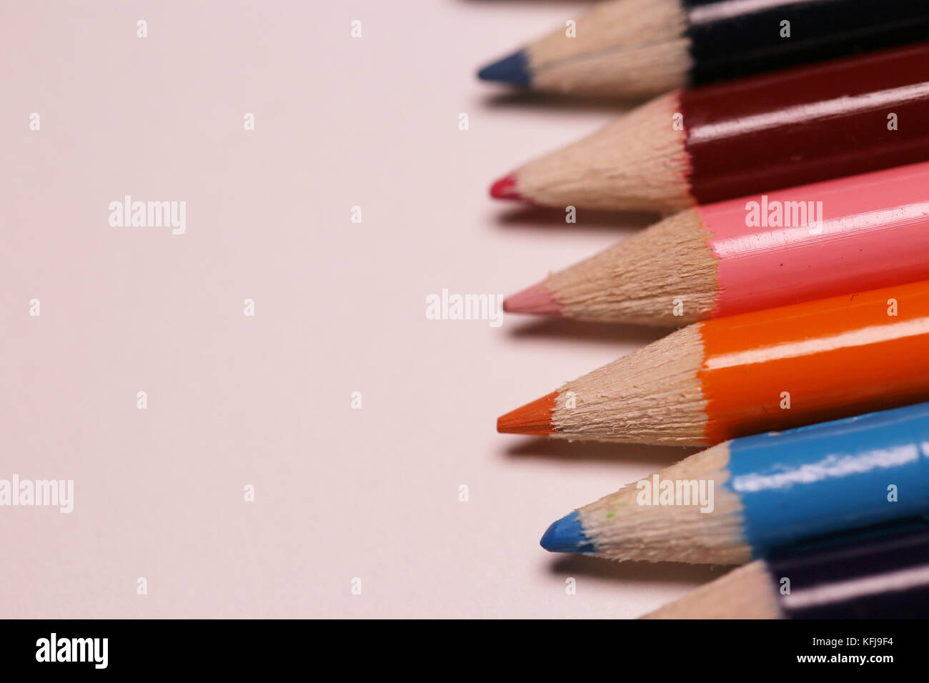 Multicolored pencils on the table. A stack of colored pencils ti Stock ...