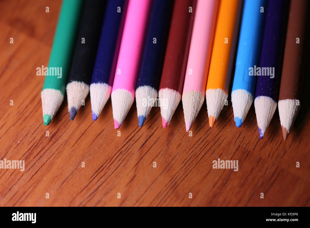 Multicolored pencils on the table. A stack of colored pencils ti Stock ...