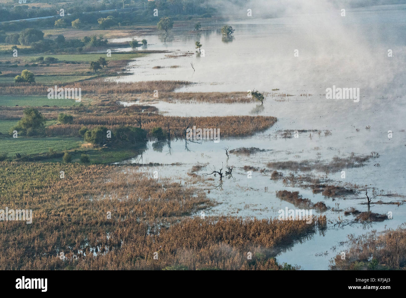 A flooded farm field consumed by Presa Isabel Allende lake outside the ...