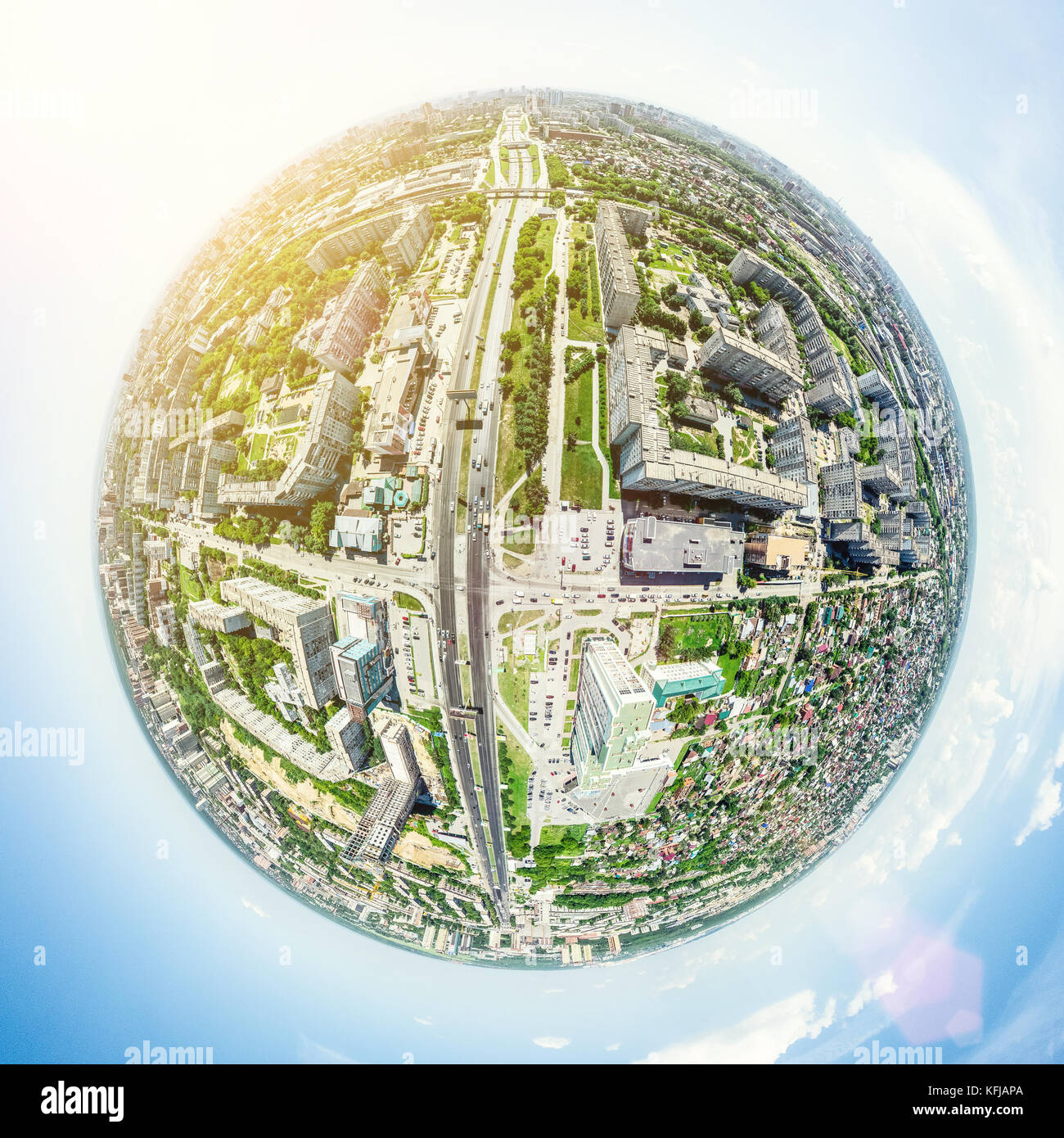 Aerial city view with crossroads and roads, houses, buildings, parks ...