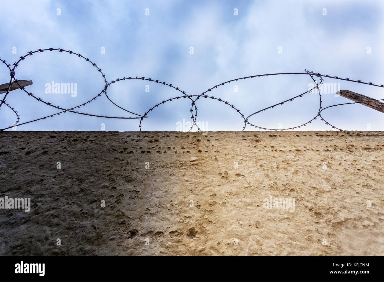 The shadow approaches the sunny wall against the background of a ...