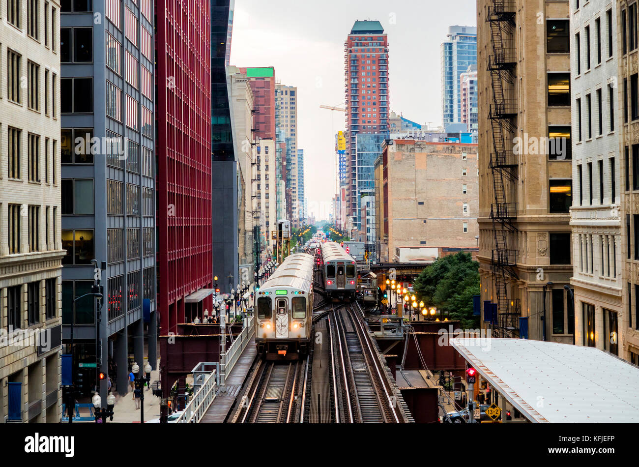 Train on elevated tracks within buildings at the Loop, Glass and Steel ...