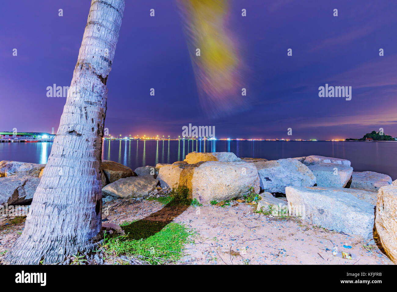 Scenic beach view in Sriracha at night in Thailand Stock Photo - Alamy