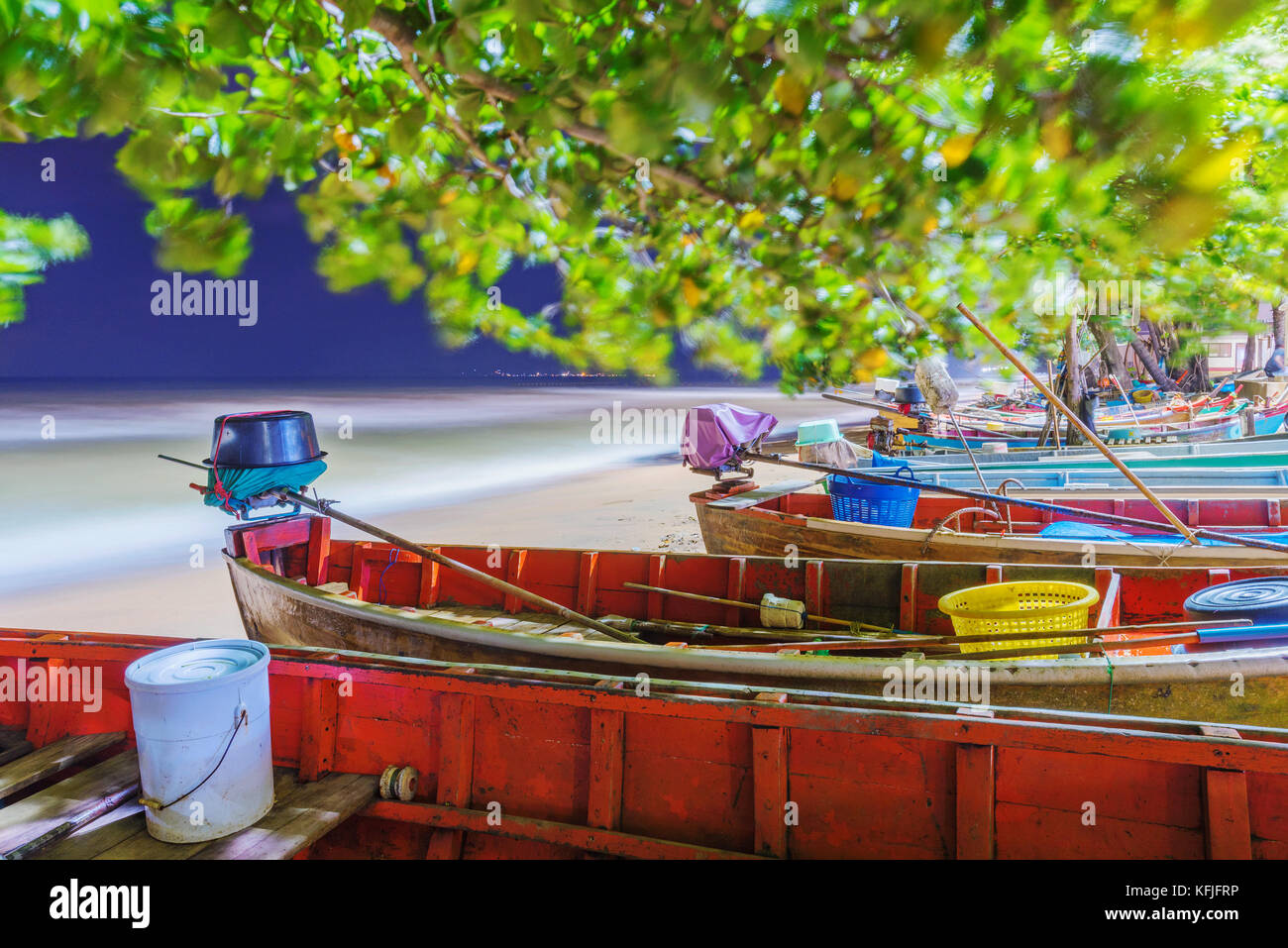 Pattaya beach fishing boats at night Stock Photo - Alamy