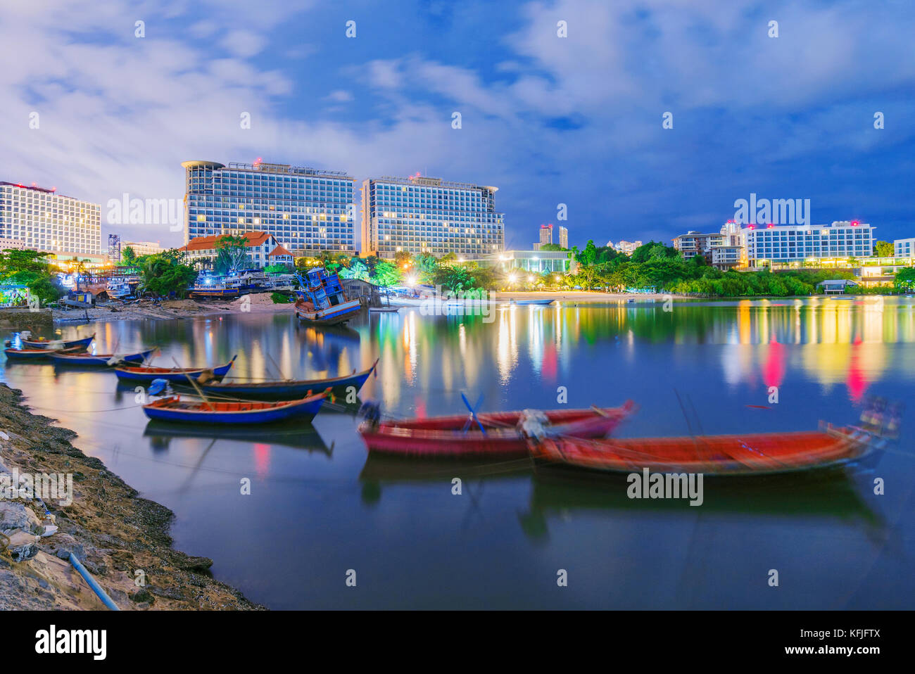 Night view of Pattaya city with boats in Thailand Stock Photo - Alamy