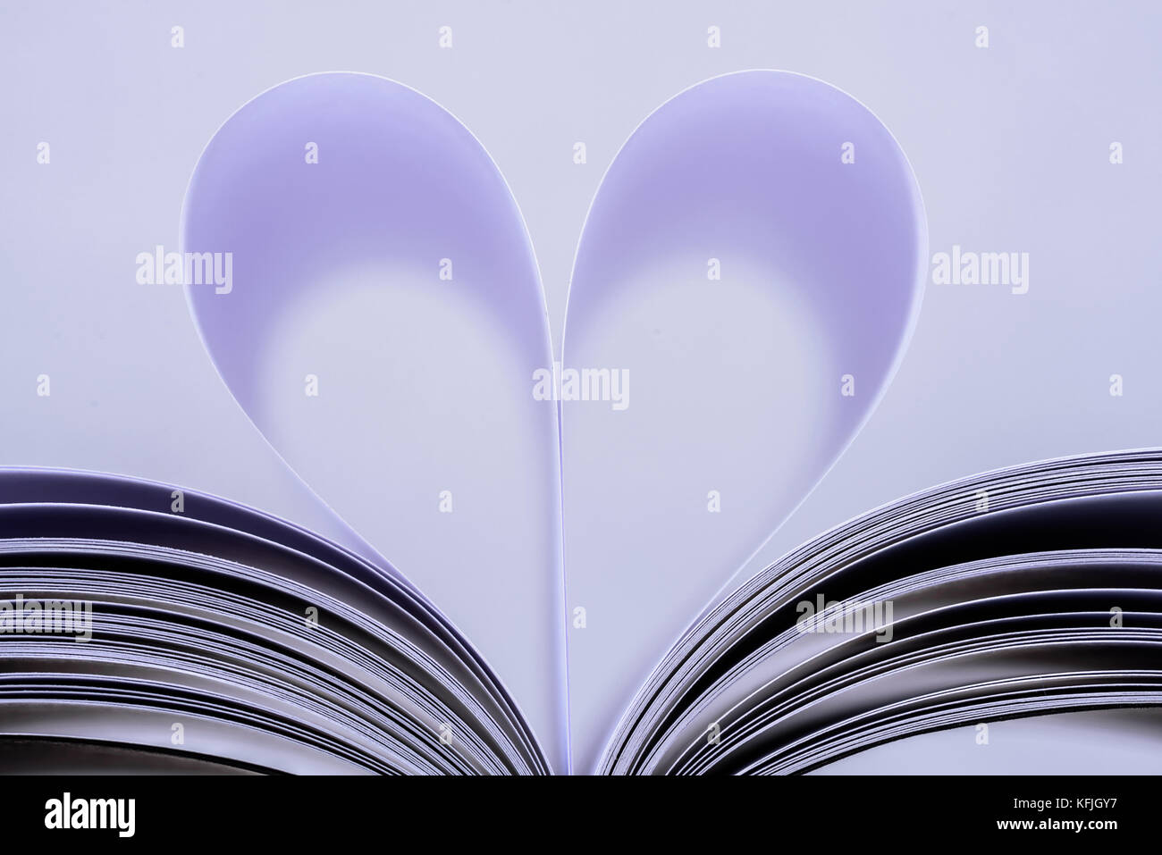 Heart Shaped Book. Book page in heart shape, focus on foreground Stock ...