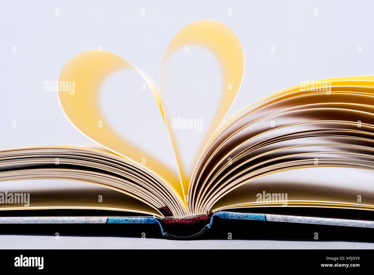 Heart Shaped Book. Book page in heart shape, focus on foreground Stock ...