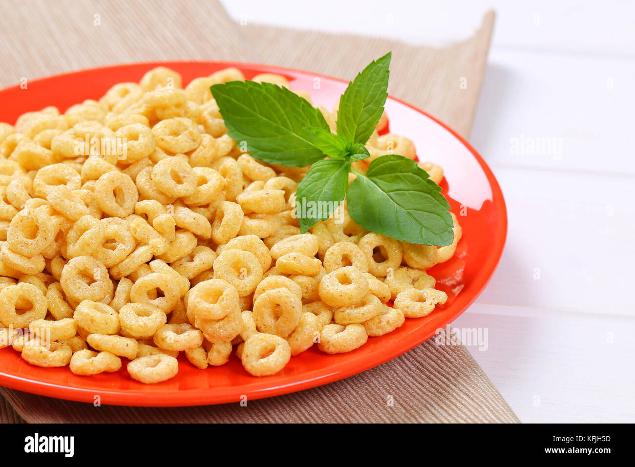 plate of honey cereal rings - close up Stock Photo - Alamy