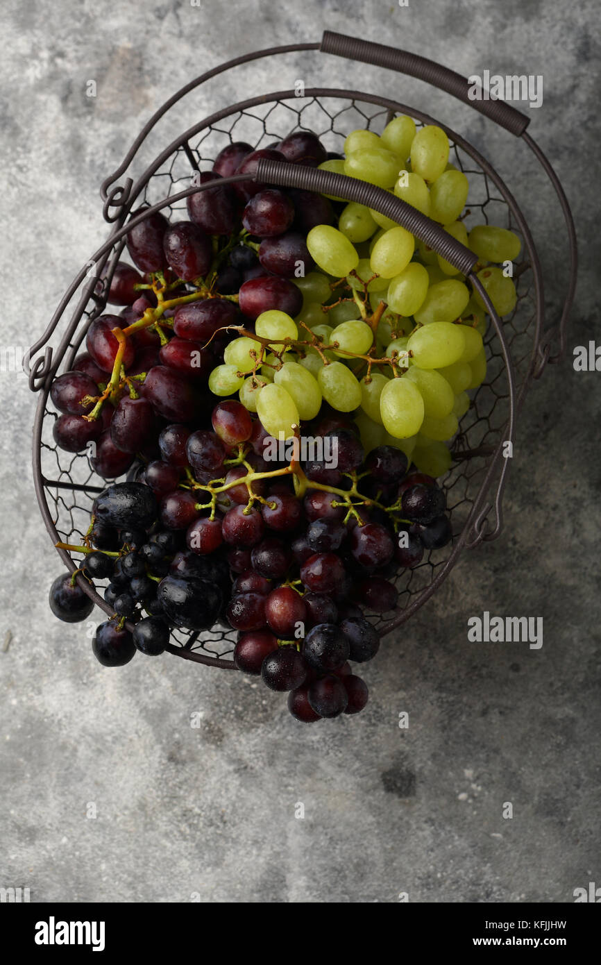 Fresh Grapes mix in basket, food above Stock Photo - Alamy