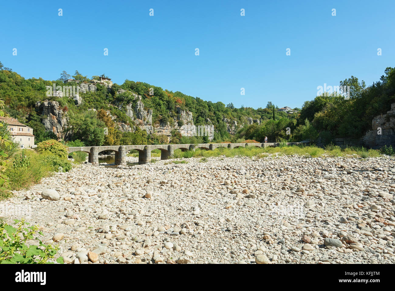 The bridge over the river Ardeche at the pitoreske village of Labeaume ...