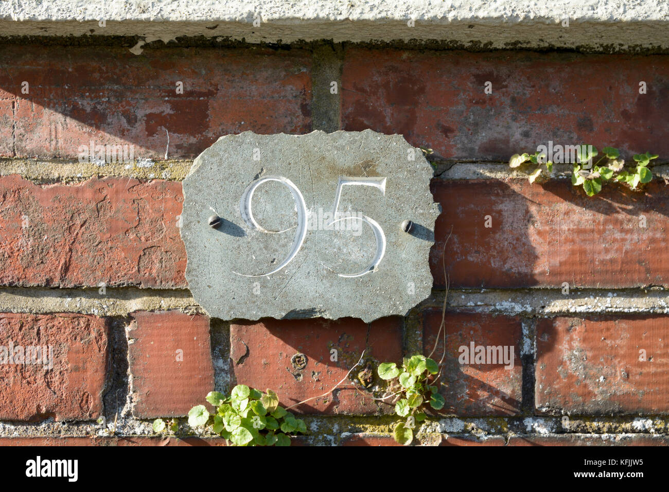 House number 95 sign on wall Stock Photo - Alamy