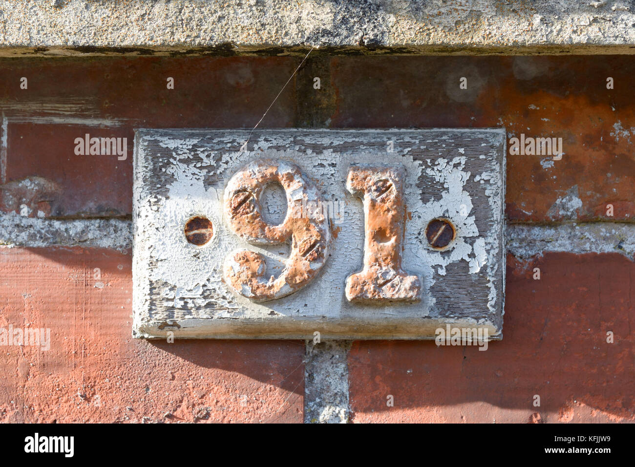 House number 91 sign on wall Stock Photo - Alamy