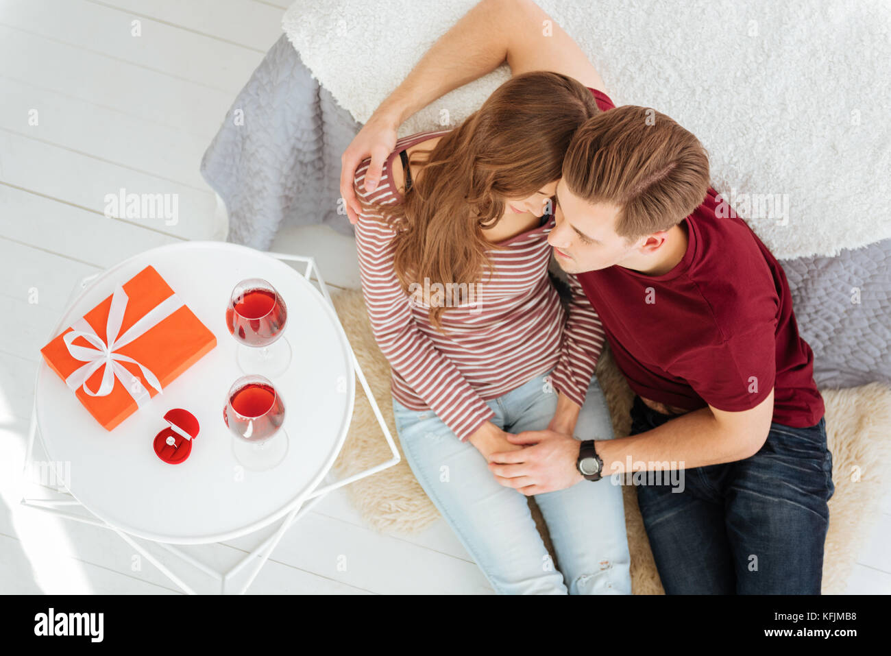 Harmonious couple embracing after engagement Stock Photo - Alamy