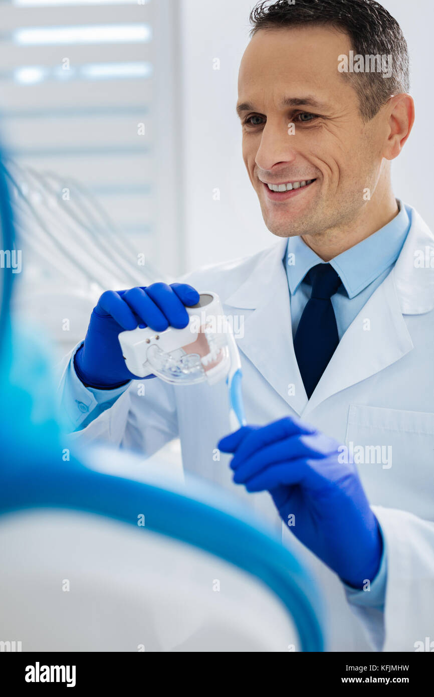 Positive professional doctor being at work Stock Photo - Alamy