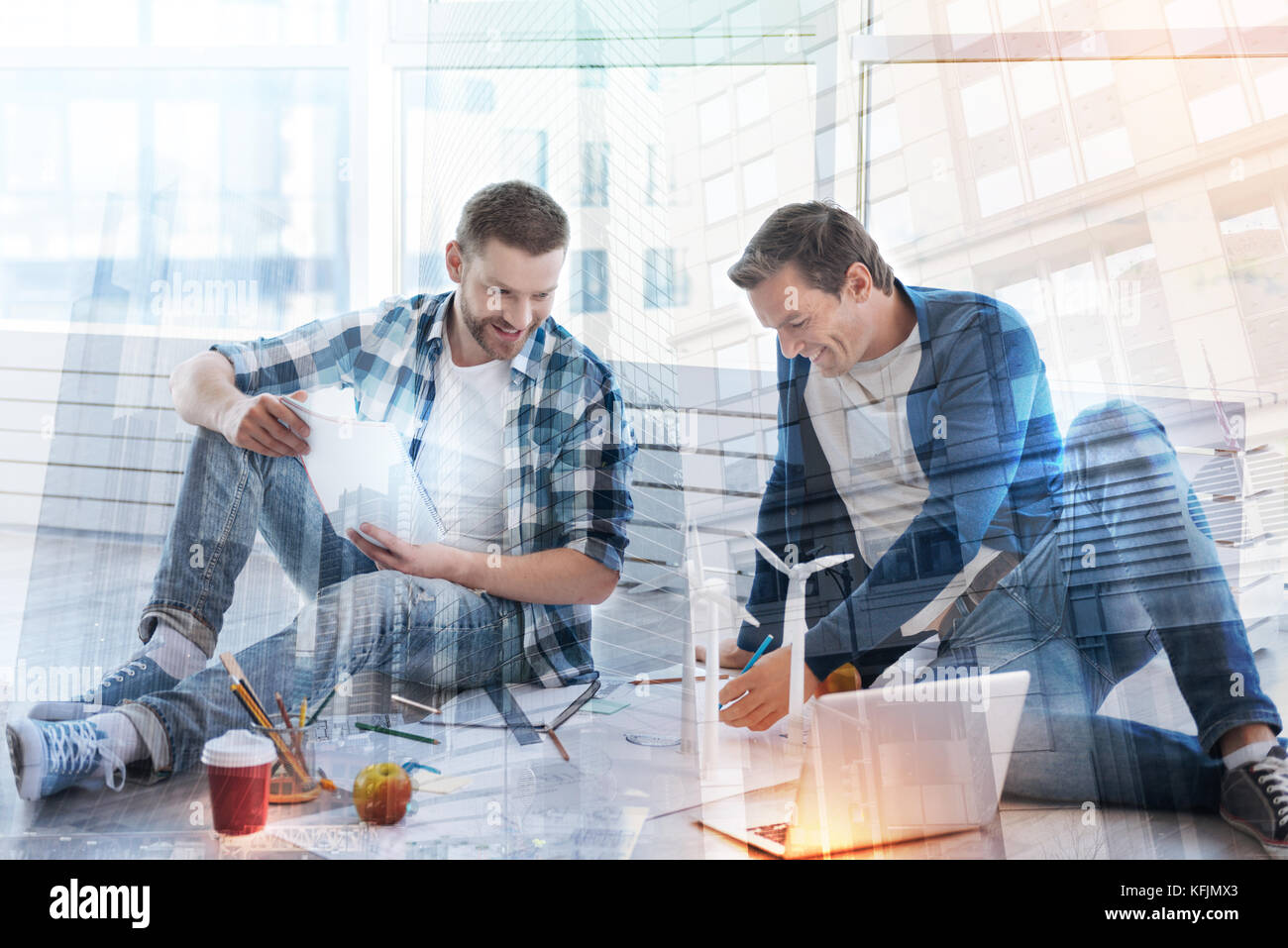Two men discussing correct variant Stock Photo - Alamy