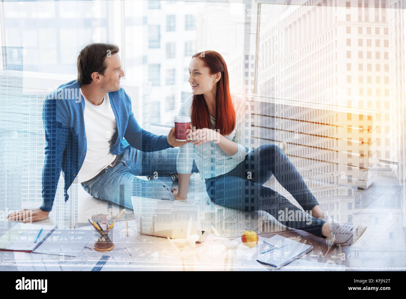 Relaxed couple having pause at work Stock Photo - Alamy