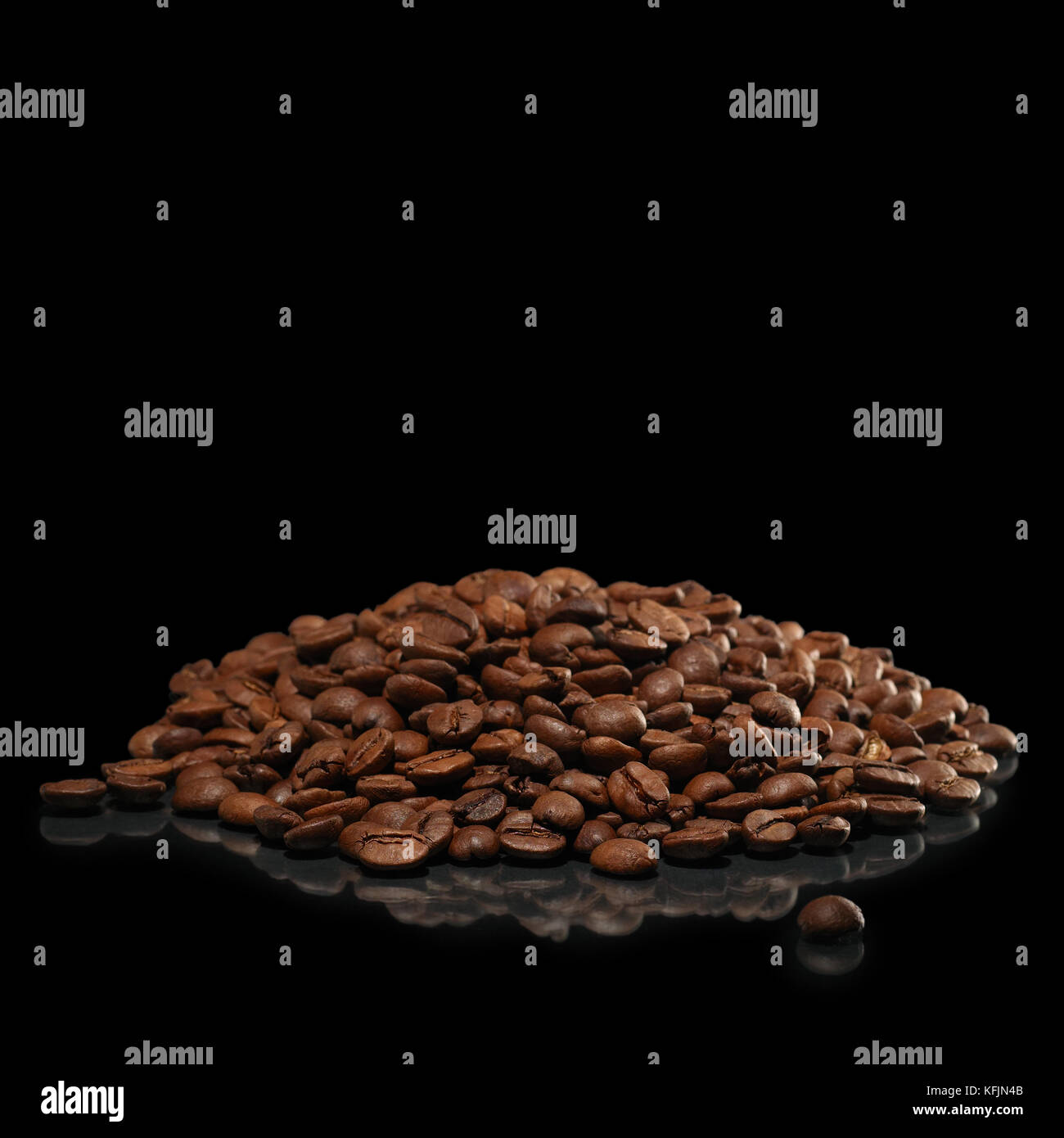 Heap of coffee beans with reflection on black background Stock Photo ...