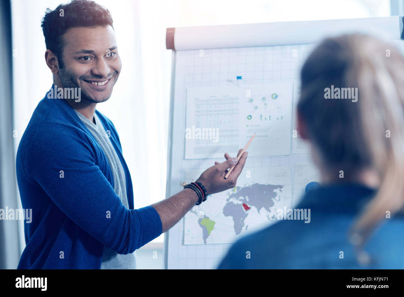 Portrait of handsome brunette man that showing his plan Stock Photo - Alamy