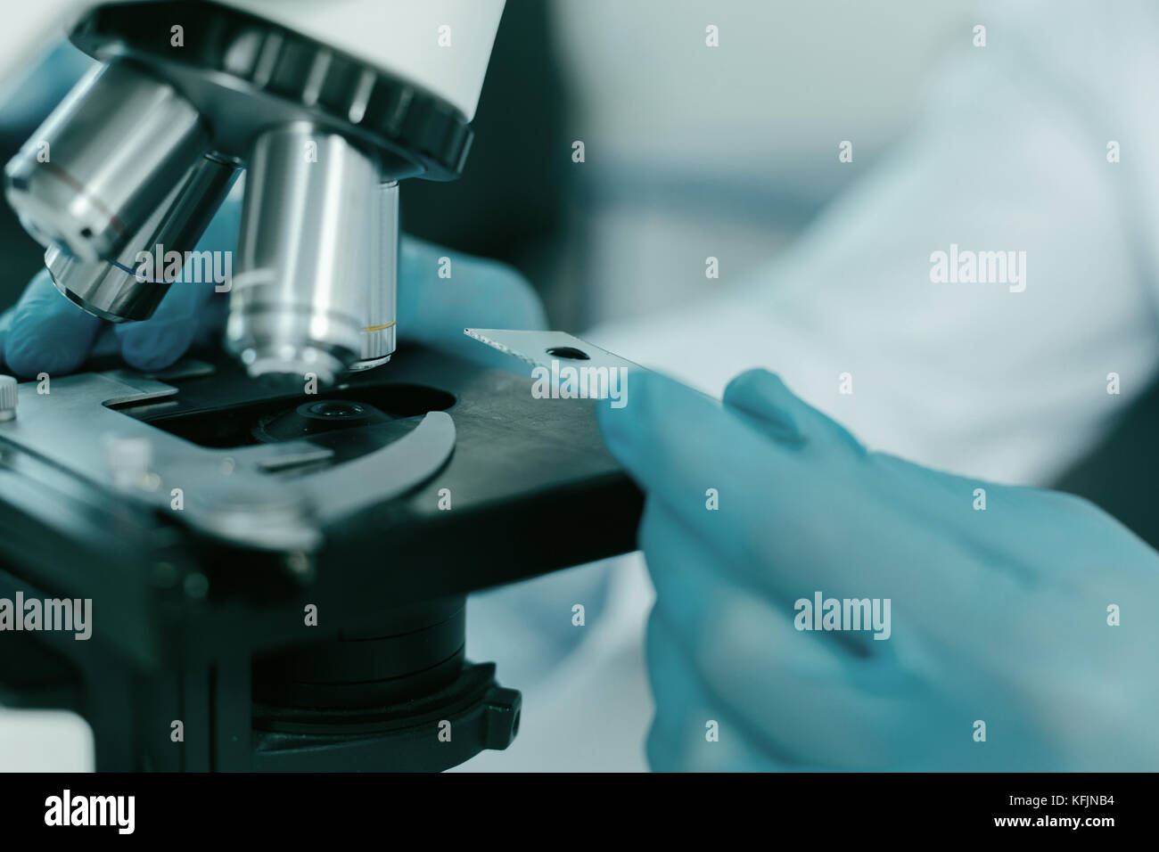 Close up of male hand that holding sample of reagent Stock Photo - Alamy